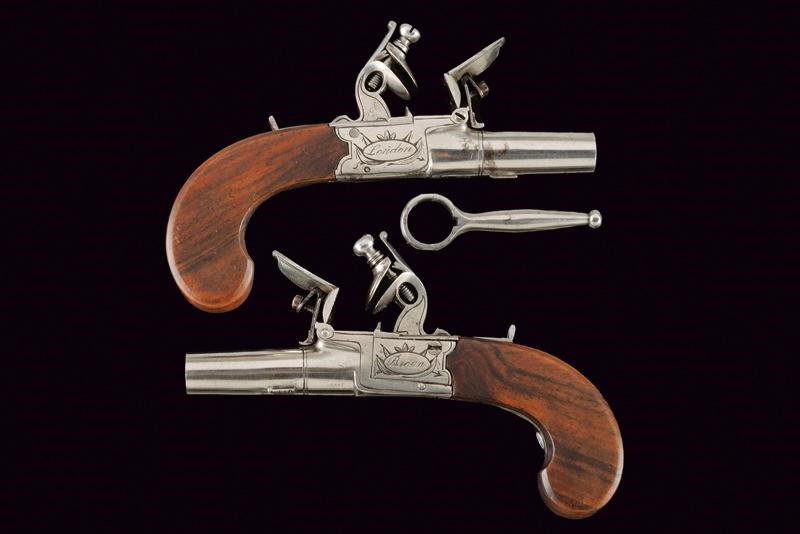 A small pair of flintlock pocket pistols by Brown Early 19th Century ...