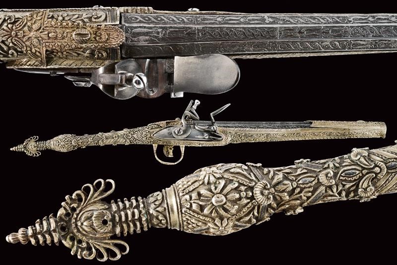 An outstanding silver mounted flintlock pistol in Roka style late 18th ...