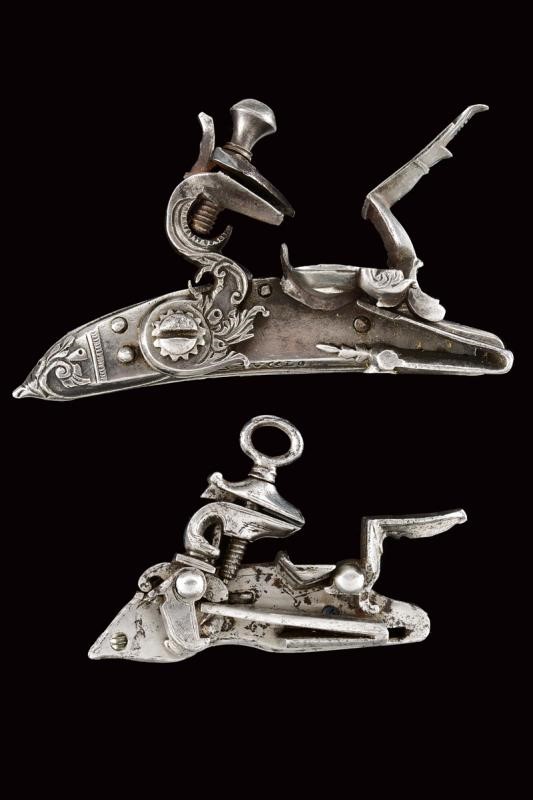 A flintlock by Bertolo Ducolo and a miquelet lock Second half of the ...