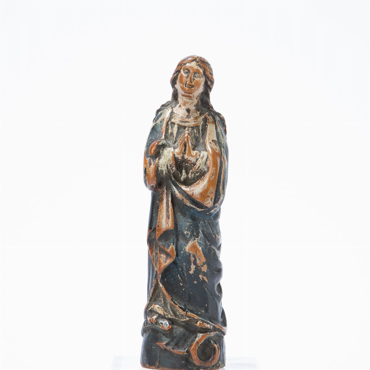 Ancient polychrome wooden sculpture depicting the Madonna of Portuguese ...