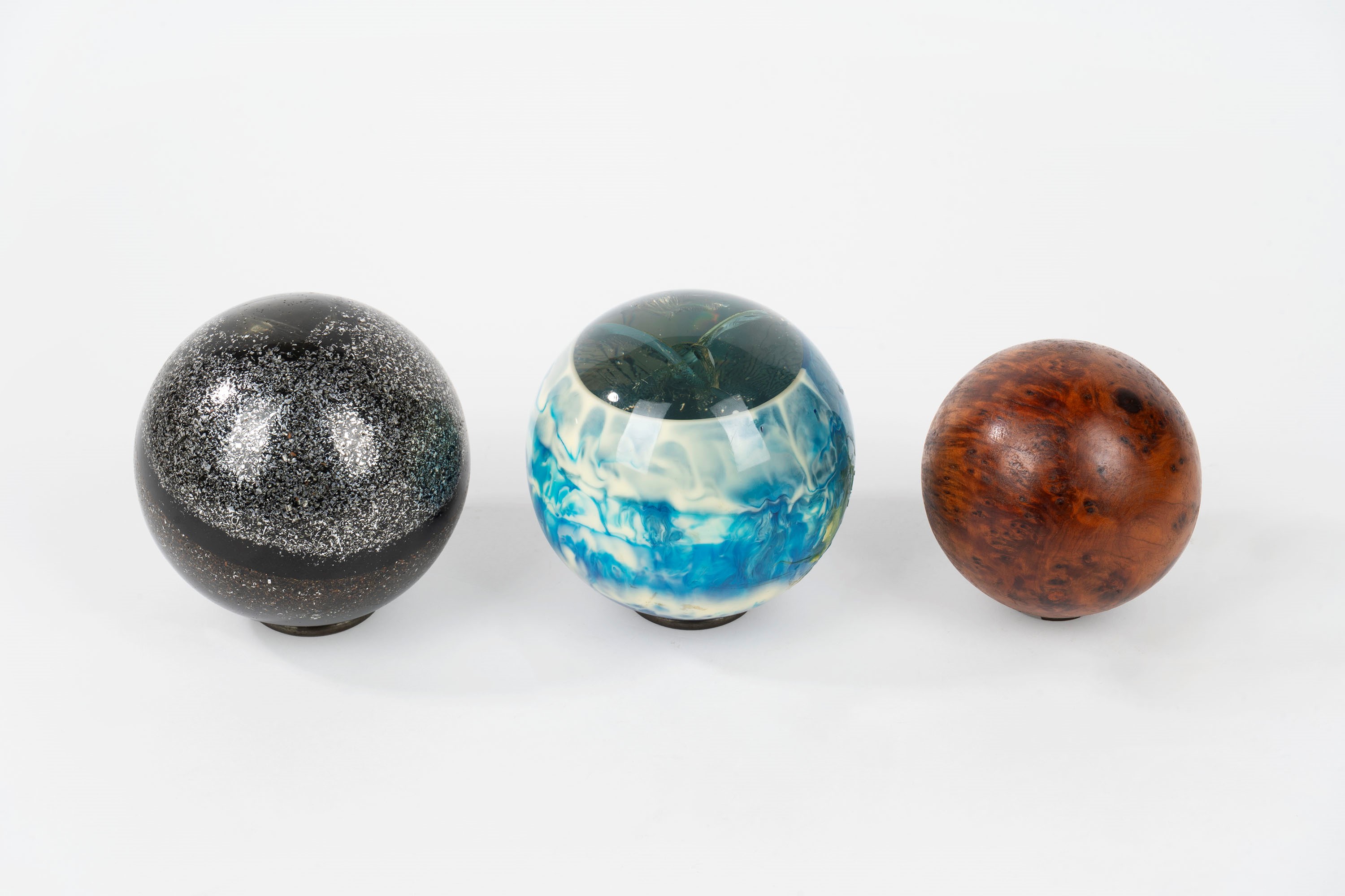 Lot consisting of three spheres: two in plexiglass and one in wood ...