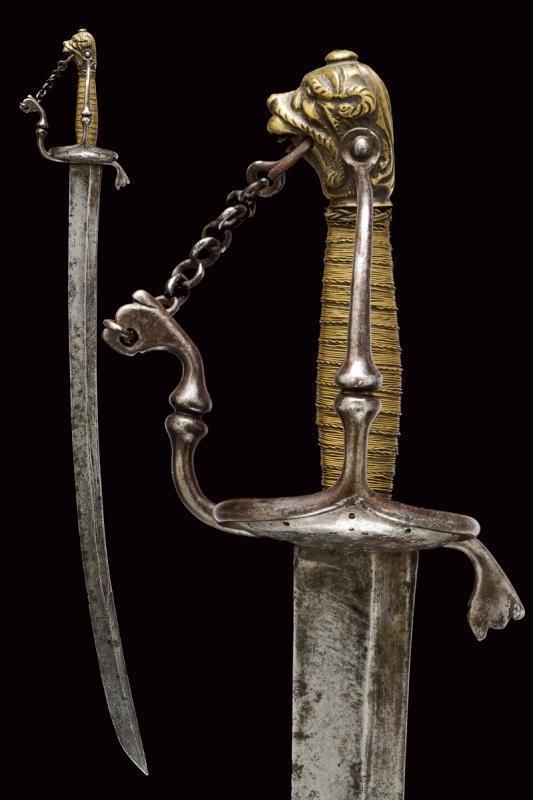A sabre with pommel shaped as a lion's head third quarter of the 17th ...