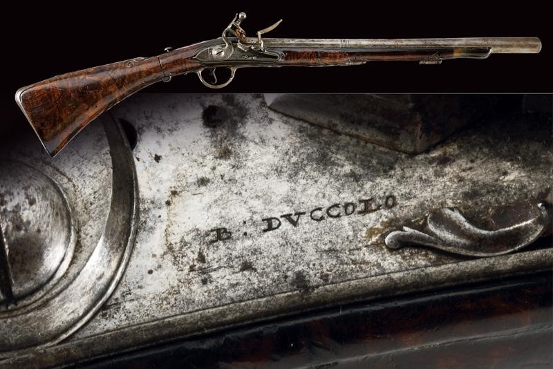 A short flintlock blunderbuss with folding stock signed B. Duccolo ...