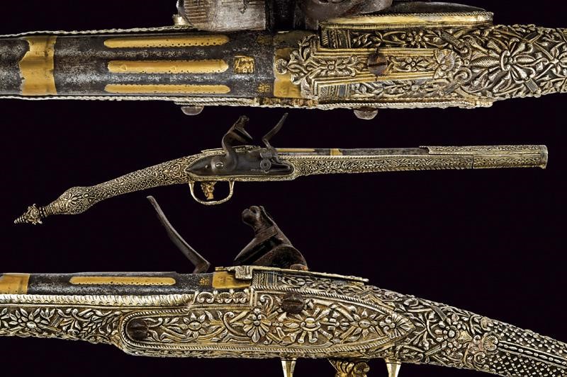A remarkable silver mounted flintlock pistol in Roka style late 18th ...
