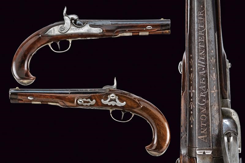 A pair of pistols by Anton Graf, converted to percussion | Fine Antique ...