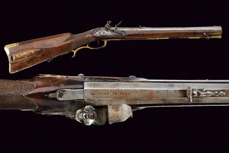 A short flintlock carbine signed Rosa first quarter of the 19th Century ...