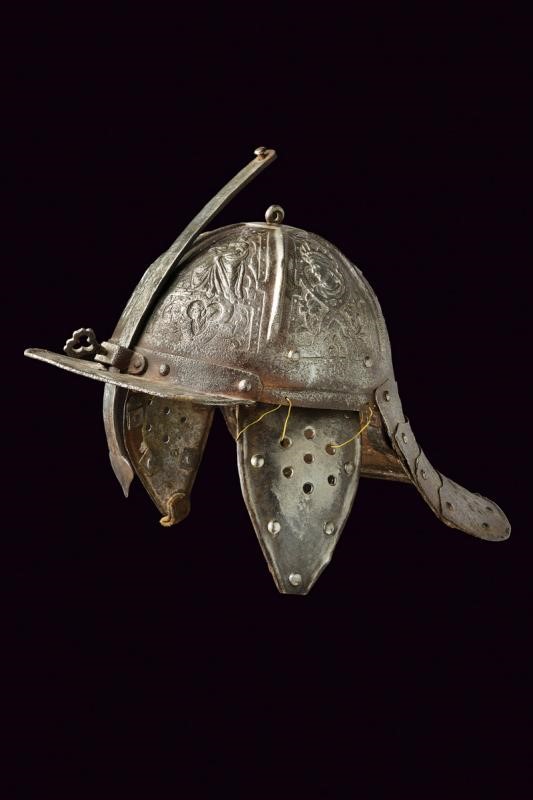 A lobster-tailed helmet with embossed decorations | Fine Antique Arms ...