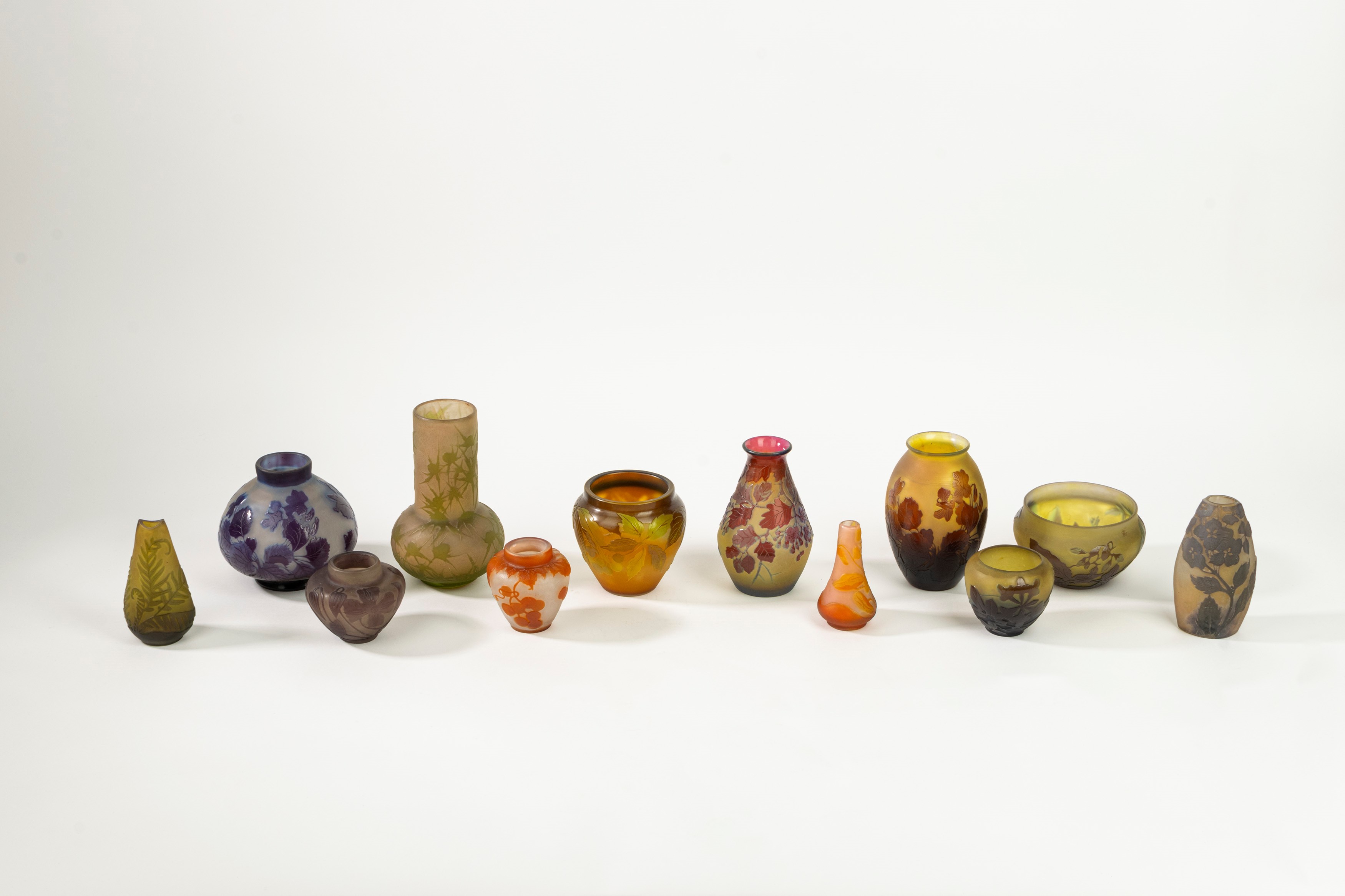 GALLE'. Collection of twelve glass jars of various shapes and sizes ...