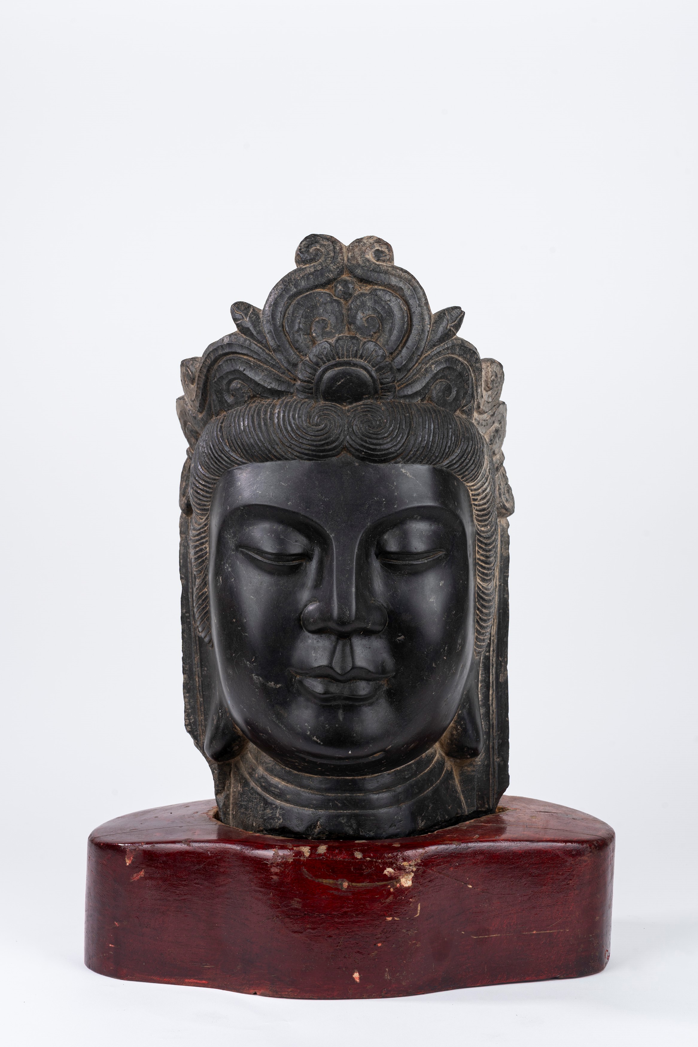 Large black stone head of Buddha, in archaic style, China, early 20th ...