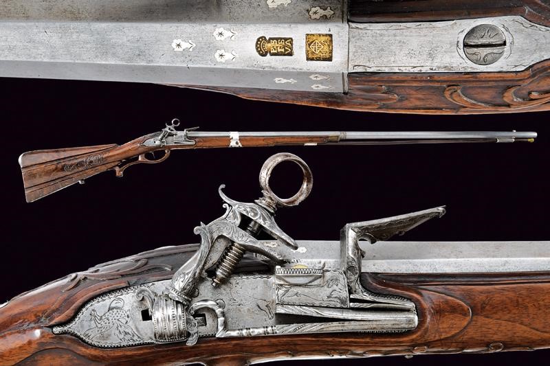 A "roman style" flintlock gun with silver mounts by F. Grassi Mid 18th ...