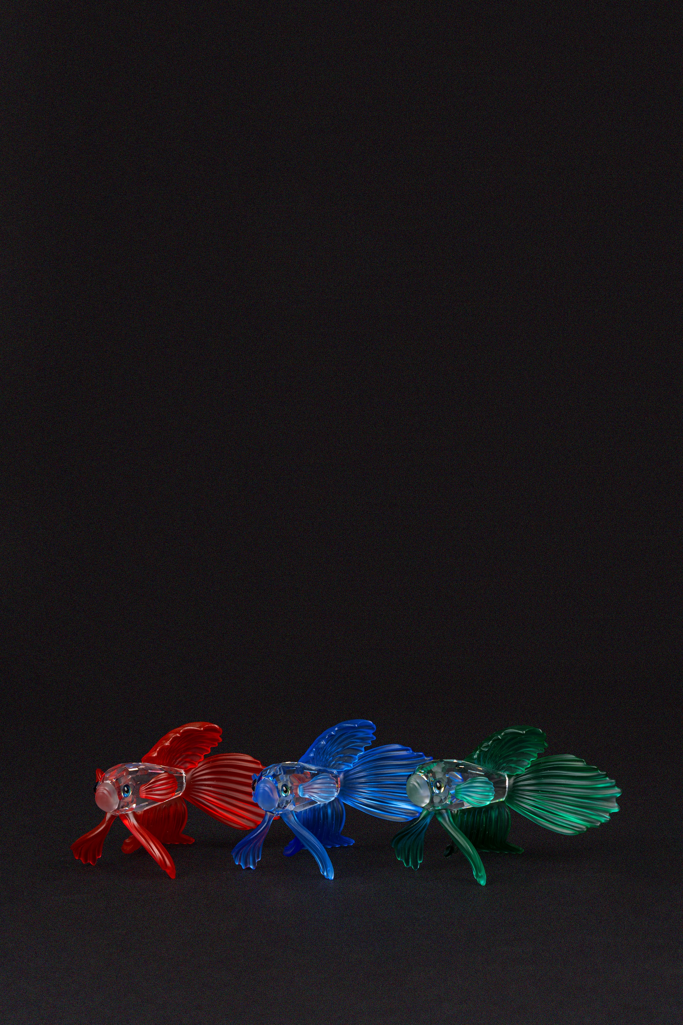 Swarovski - Lot consisting of three fighting fish | Charms of Art ...