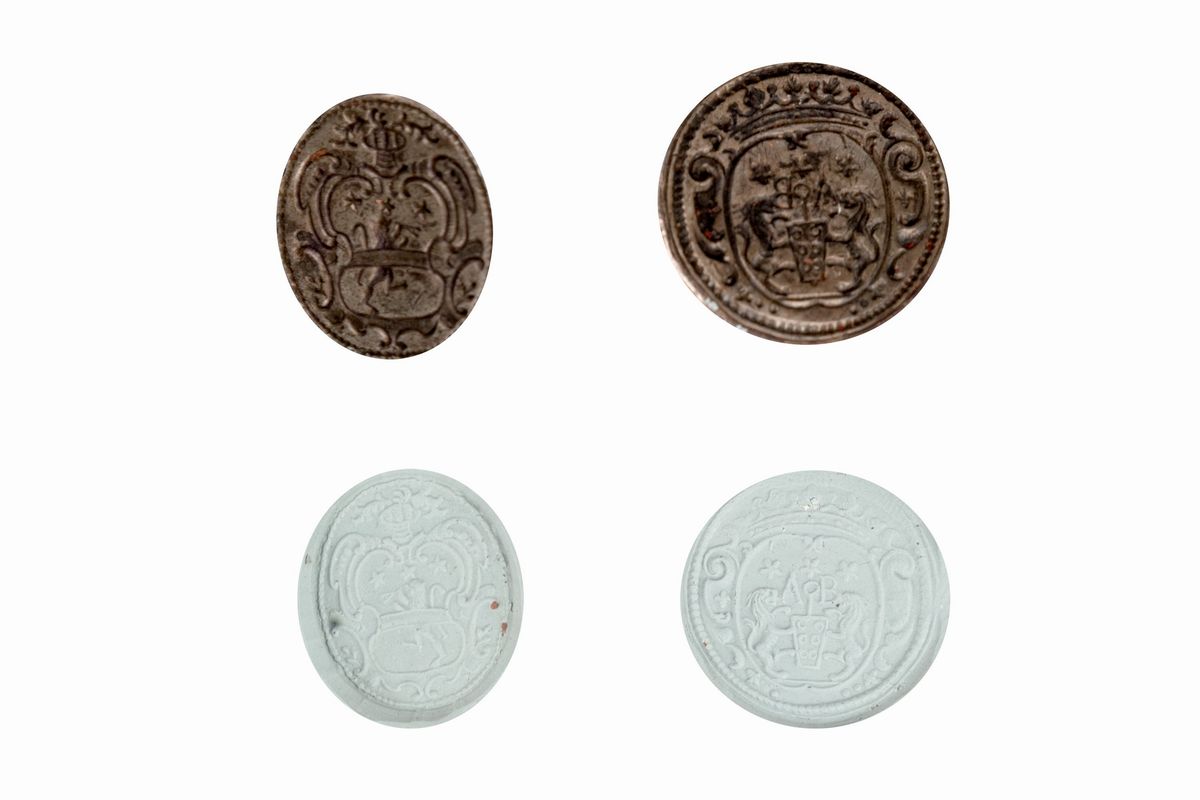 Two silver seals with turned wooden handle, with noble coats of arms ...